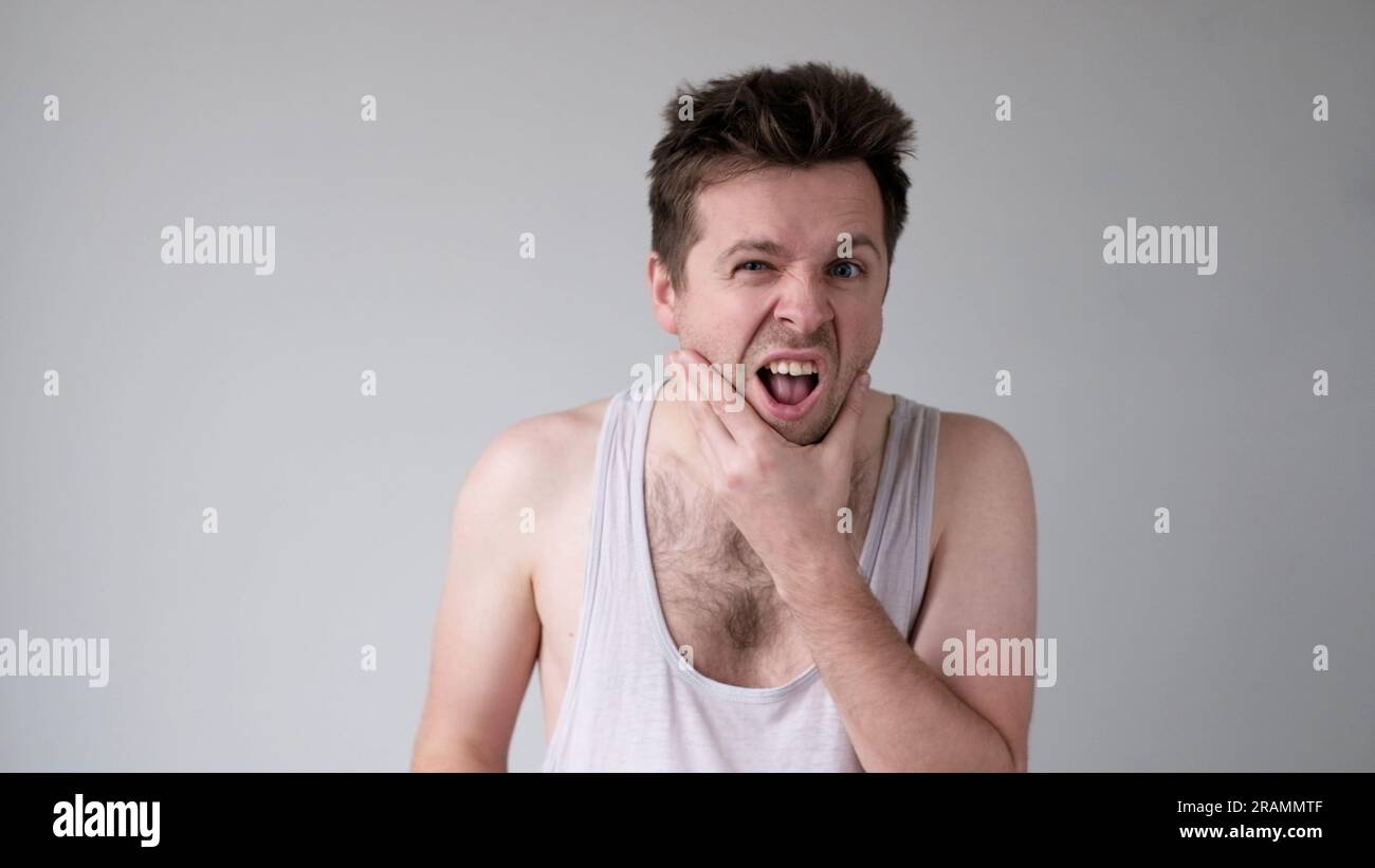 Man scratching his chin hi-res stock photography and images - Alamy