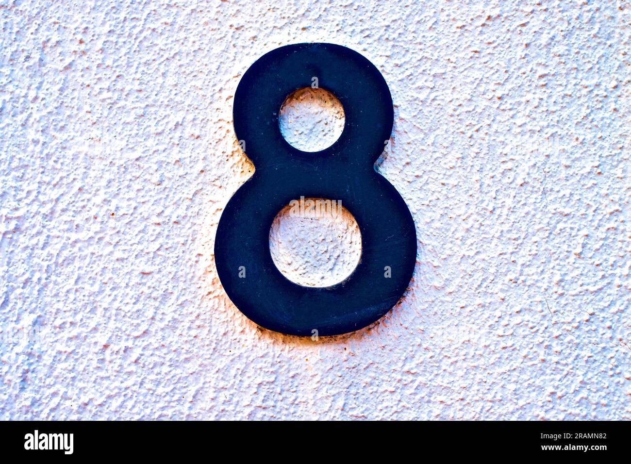 Eight, number 8, black digit on pastel wall Stock Photo - Alamy Eight, number 8, black digit on pastel wall Stock Photo - Alamy