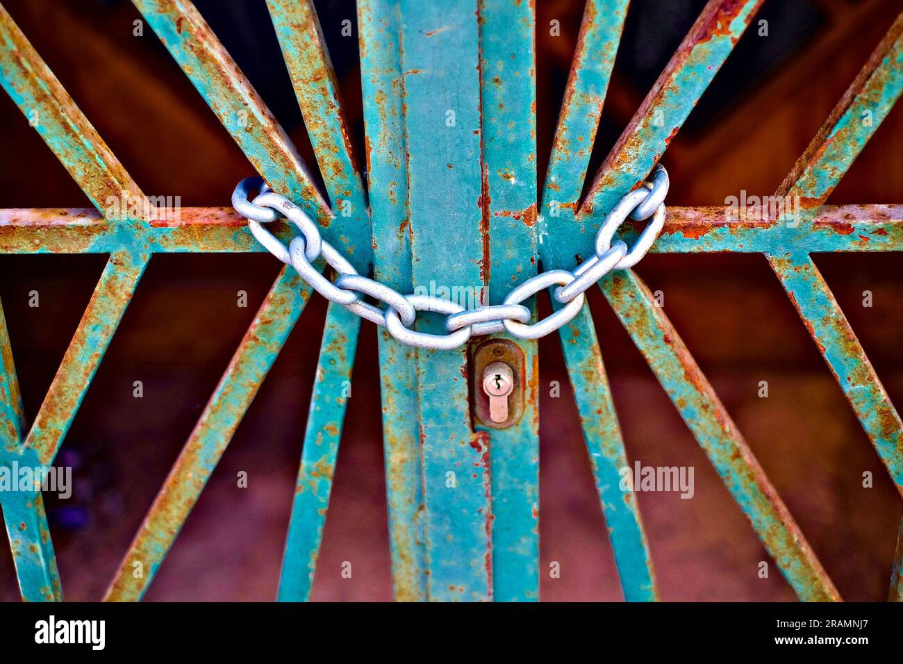 Chained and locked gate entrance Stock Photo - Alamy