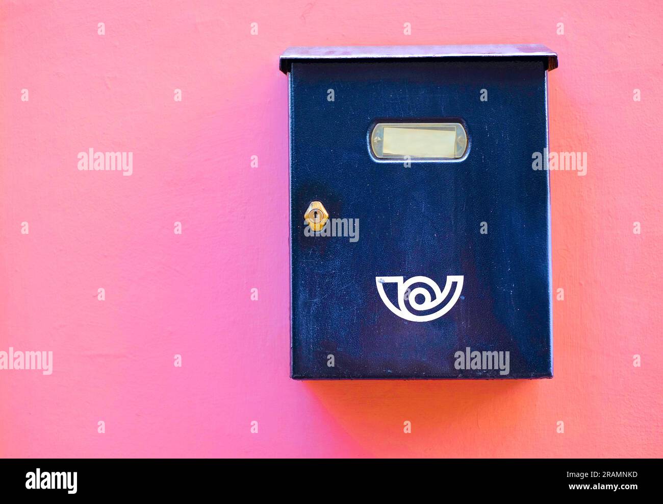 Blue letter box on pink wall Stock Photo - Alamy