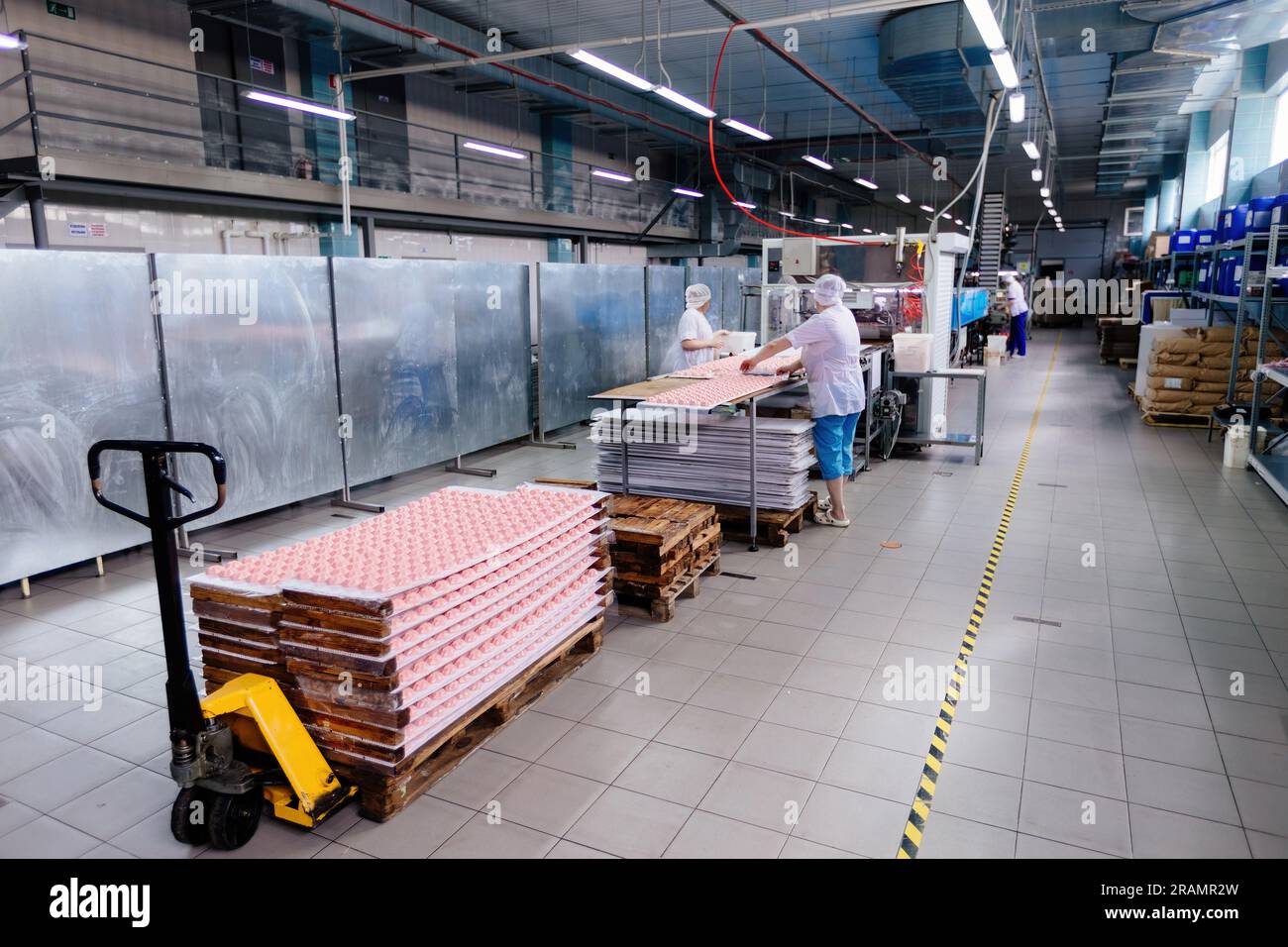 Confectionery workers on marshmallow production line Stock Photo - Alamy
