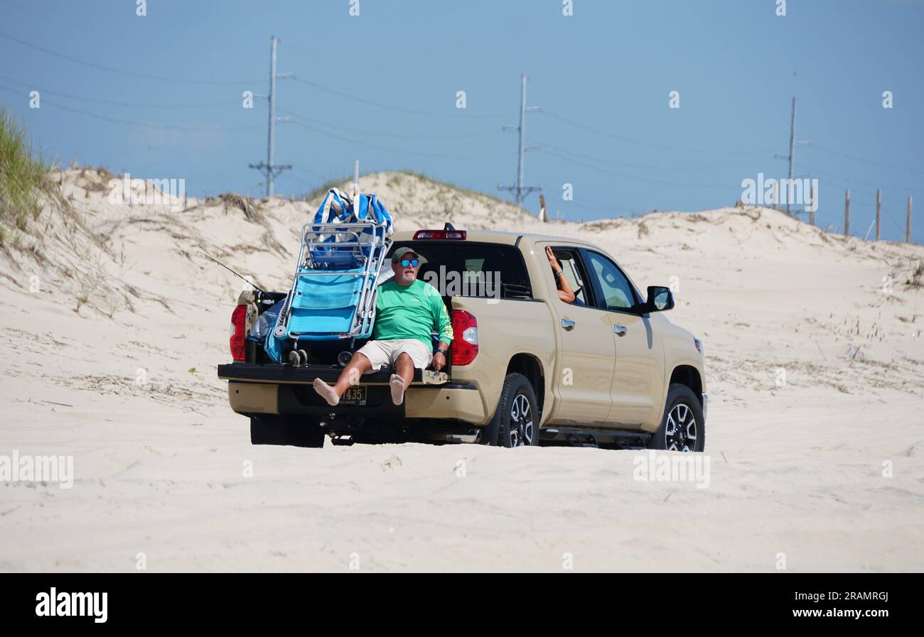 Savage Ditch, Delaware, U.S.A - July 4, 2023 - A man riding a truck ...
