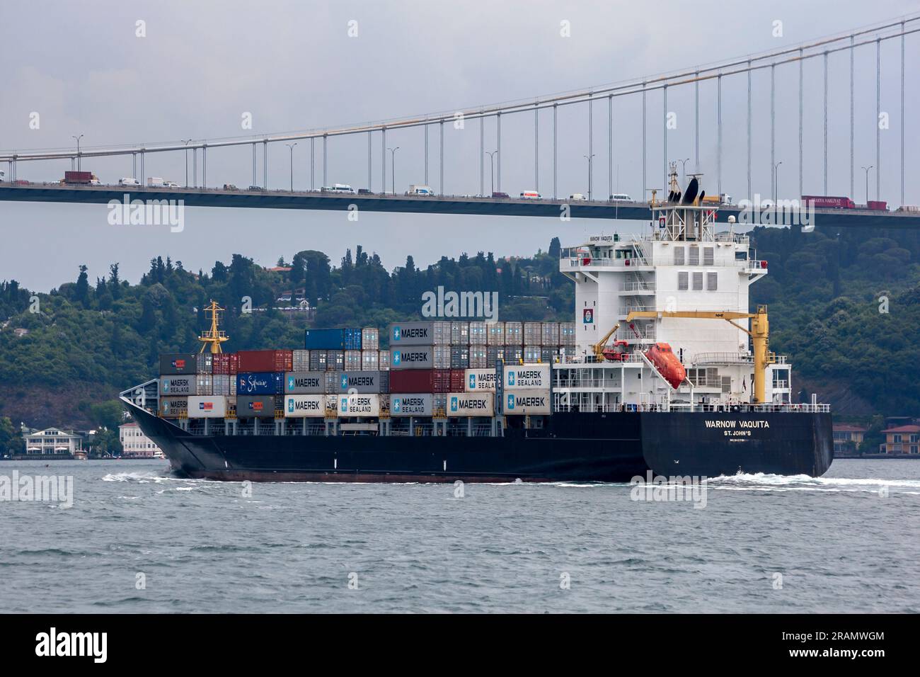 A container ship loaded with cargo moves along the Bosphorus Strait ... A container ship loaded with cargo moves along the Bosphorus Strait ...