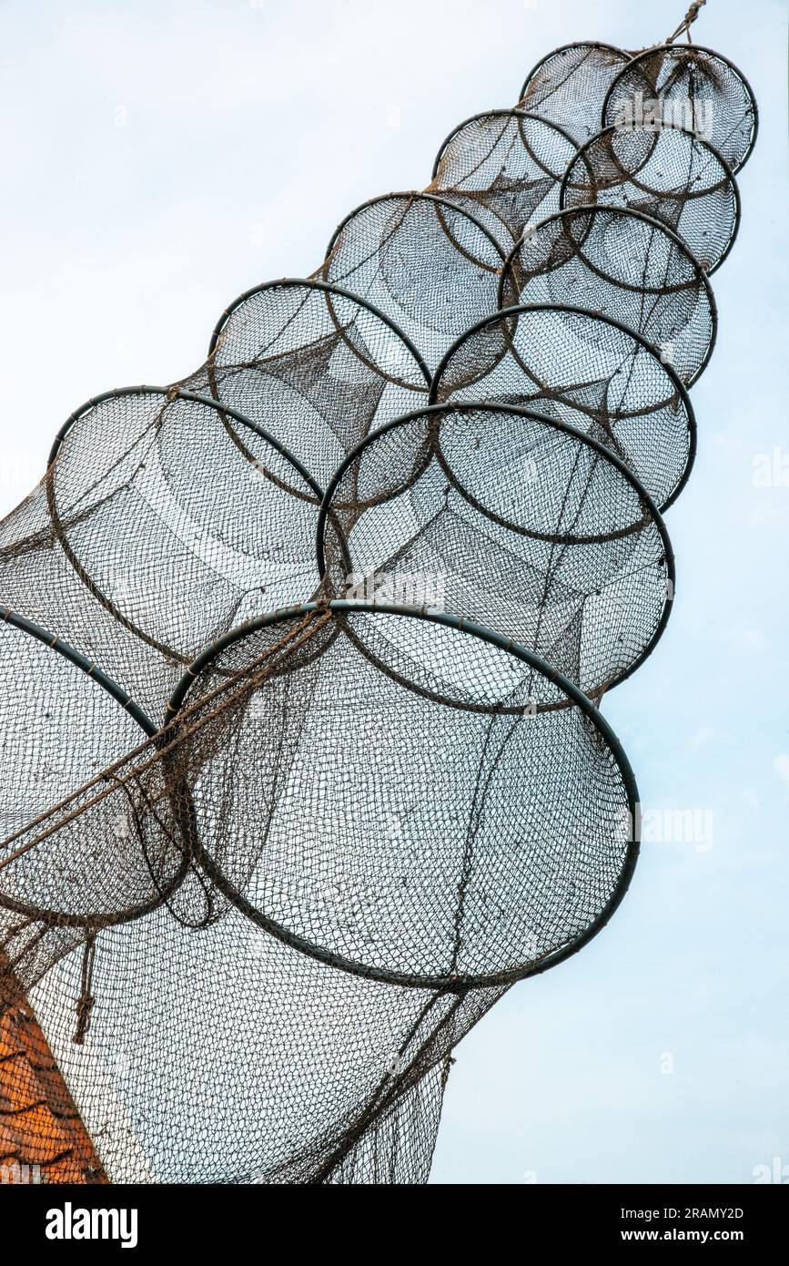 hanging fish trawl or fish trap with hoops to catch fish Stock Photo ...