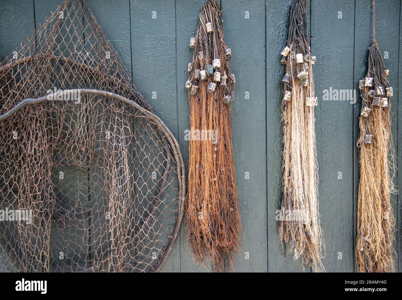 fishing nets hung on a wall Stock Photo - Alamy