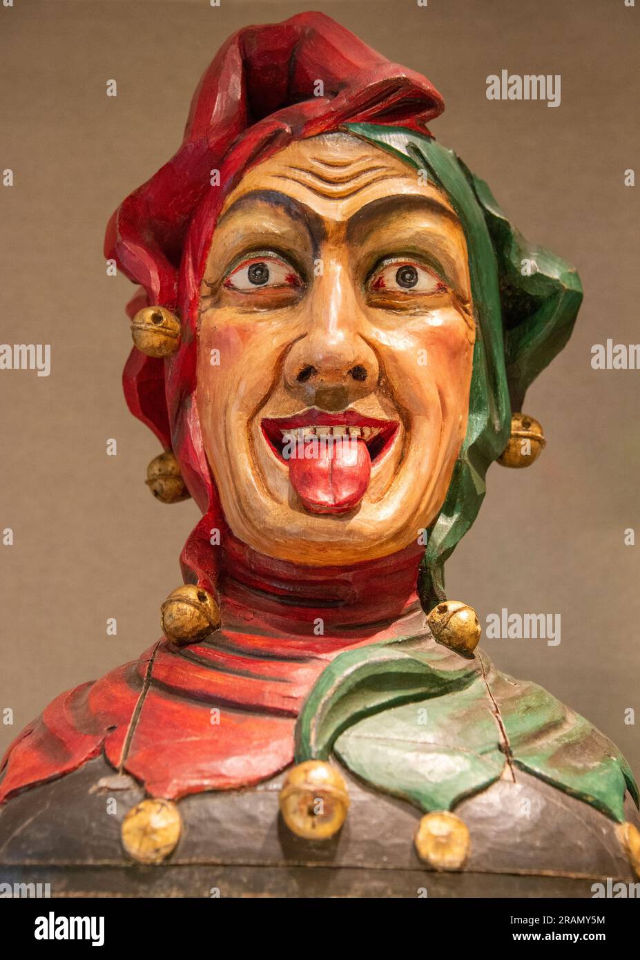 wooden jester gaper used outside a Dutch pharmacy that mimic "Say Aaaa ...