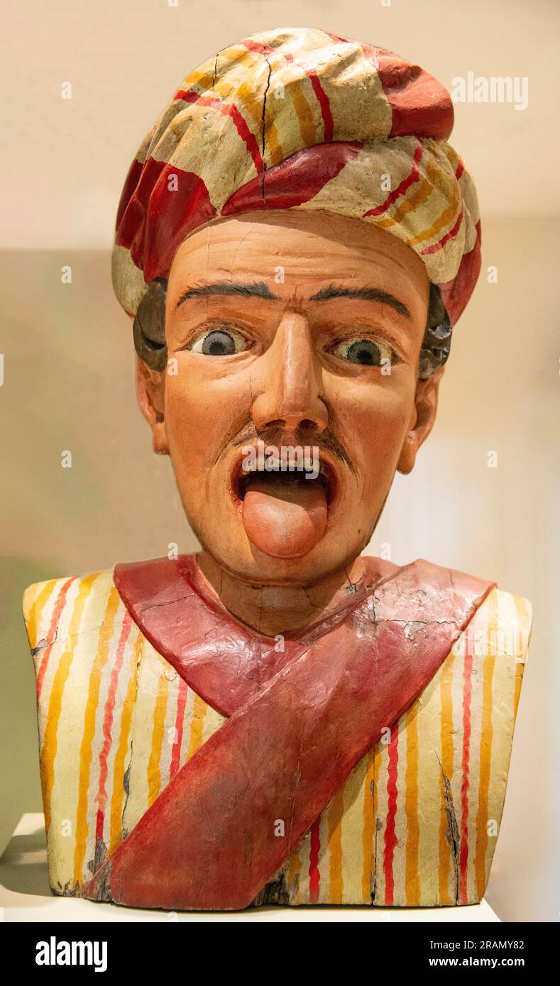 wooden gaper with a turban used outside a Dutch pharmacy that mimic ...