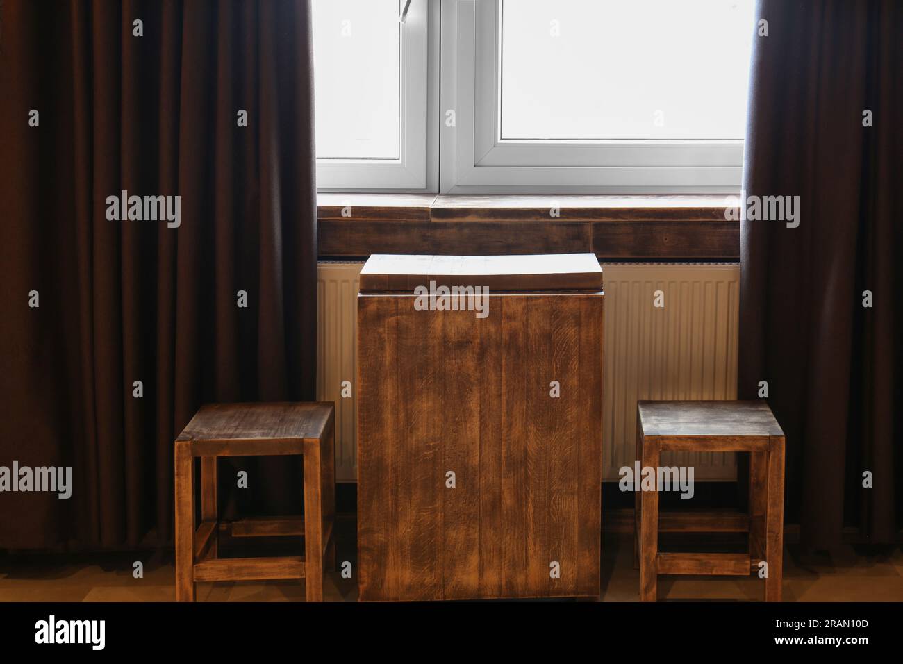 Wooden chairs and table near window in hotel room Stock Photo - Alamy