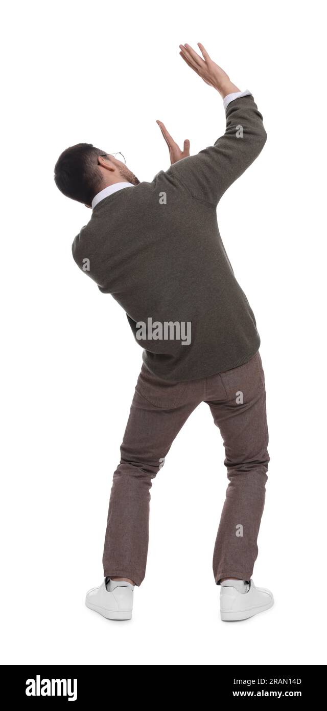 Businessman evading something on white background, back view Stock ...