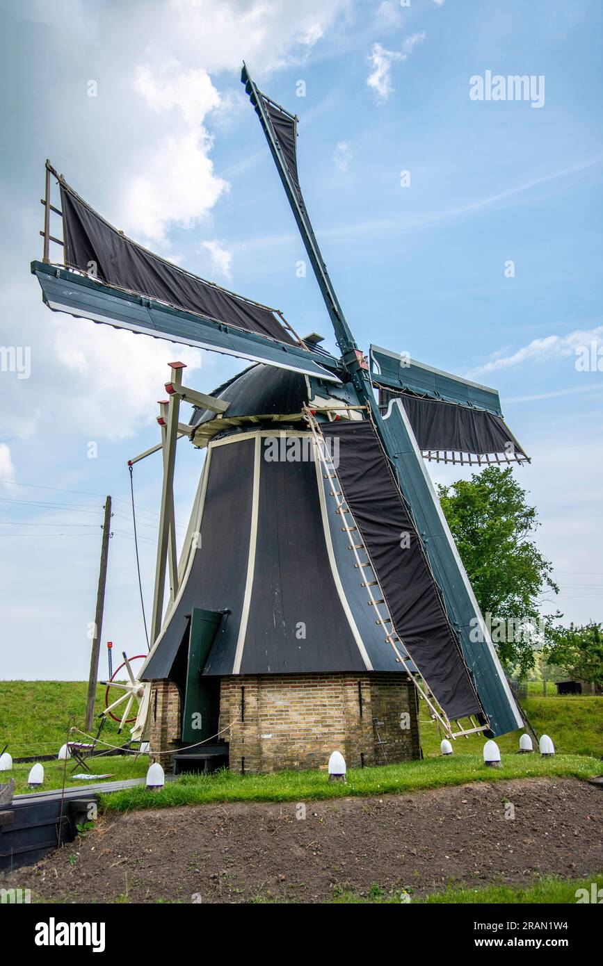 Dutch windmill at the Zuiderzee Museum used to drain water in Friesland ...