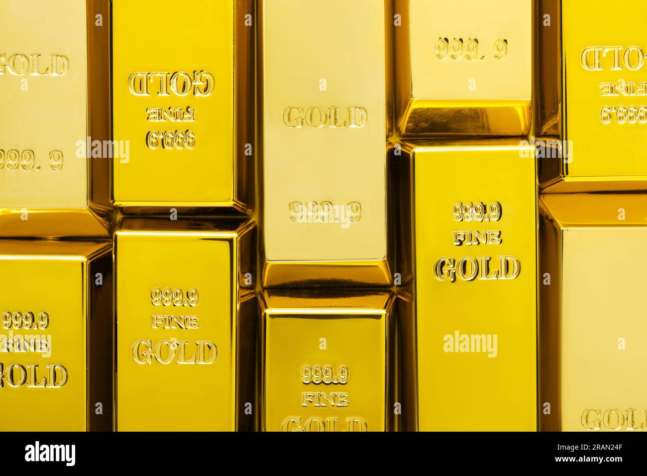 Many shiny gold bars as background, top view Stock Photo - Alamy