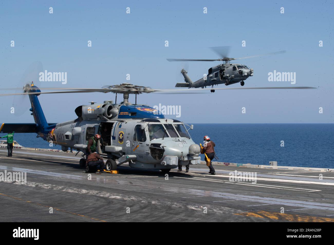Sailors assigned to the “Spartans” of Helicopter Maritime Strike ...