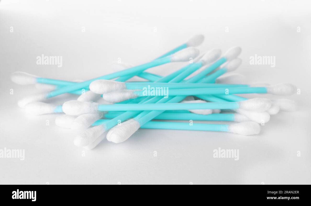 Heap of clean cotton buds on white background Stock Photo - Alamy