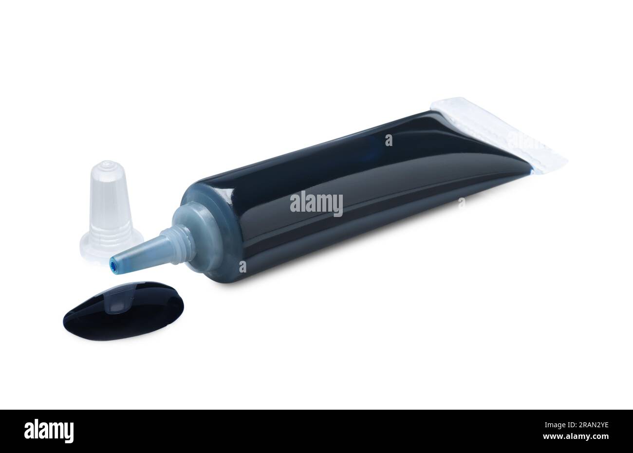 Tube with dark green food coloring isolated on white Stock Photo - Alamy