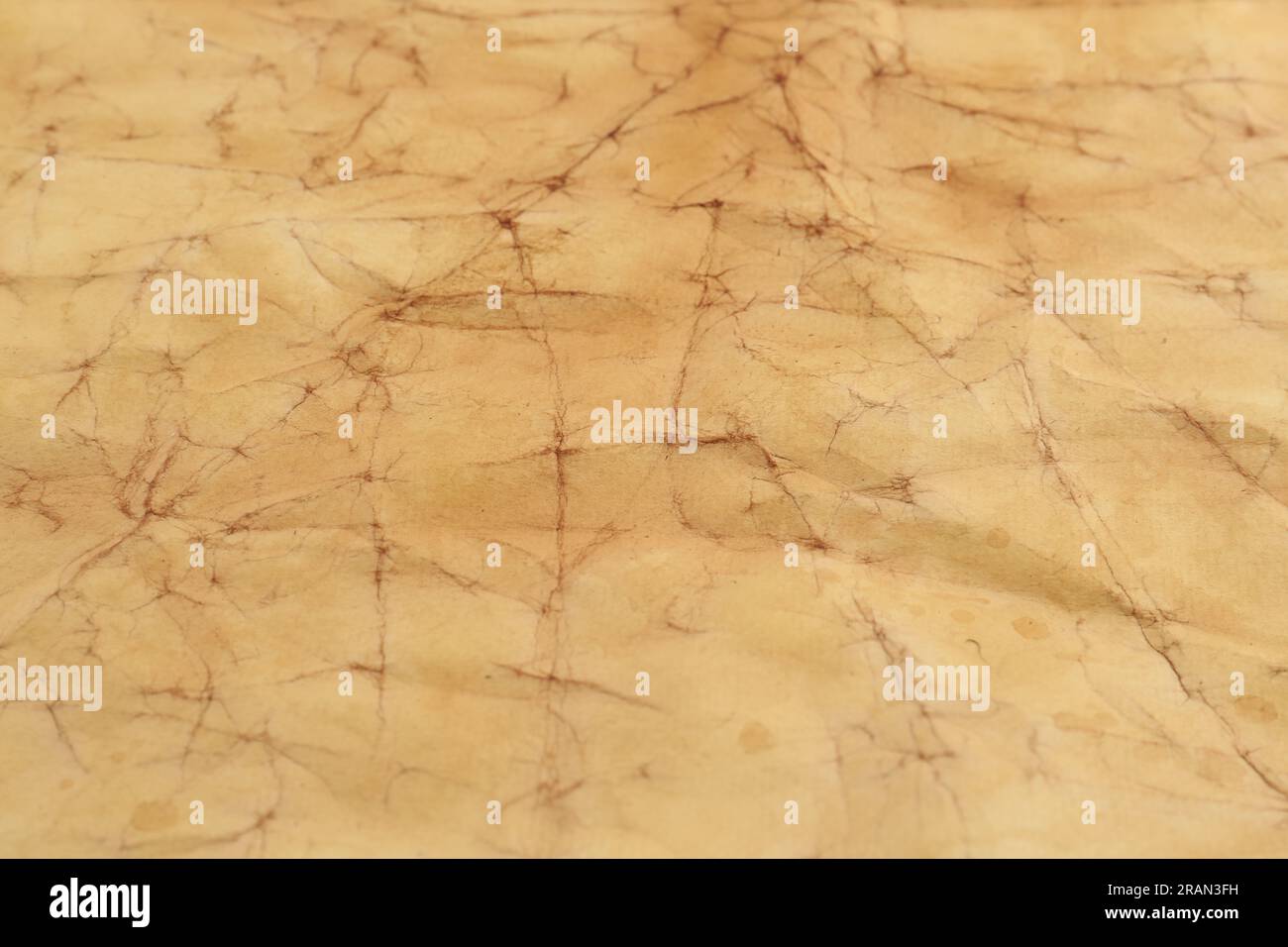 Sheet of parchment paper as background, closeup Stock Photo - Alamy