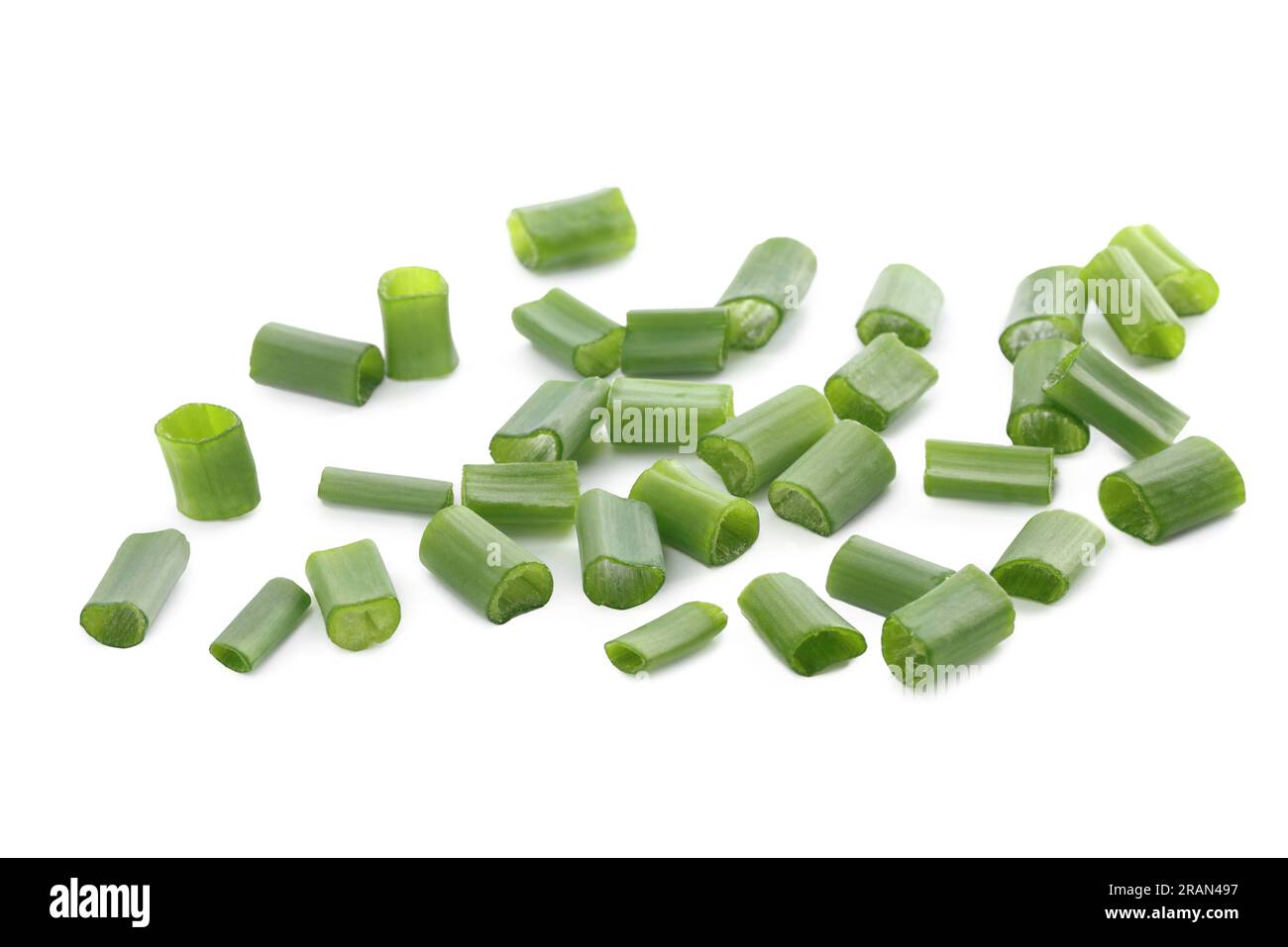 Chopped fresh green onions on white background Stock Photo - Alamy