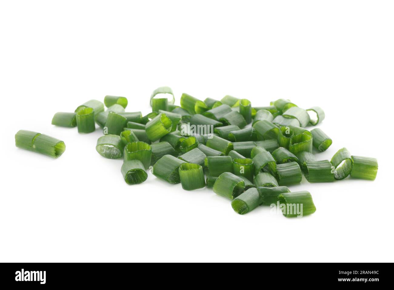 Chopped fresh green onions on white background Stock Photo - Alamy