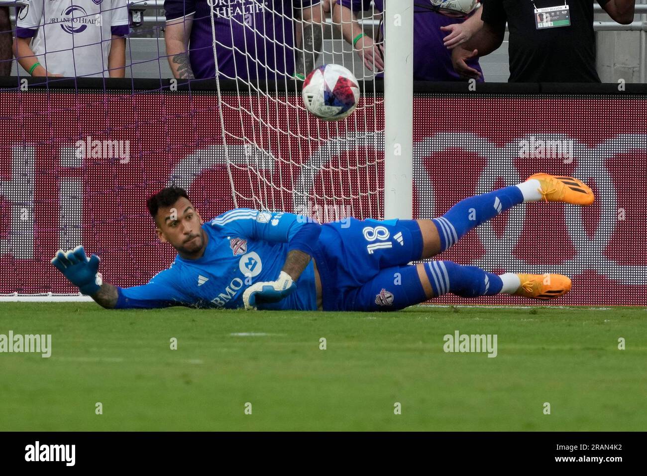 Toronto FC goalkeeper Greg Ranjitsingh blocks a shot by Orlando City ...