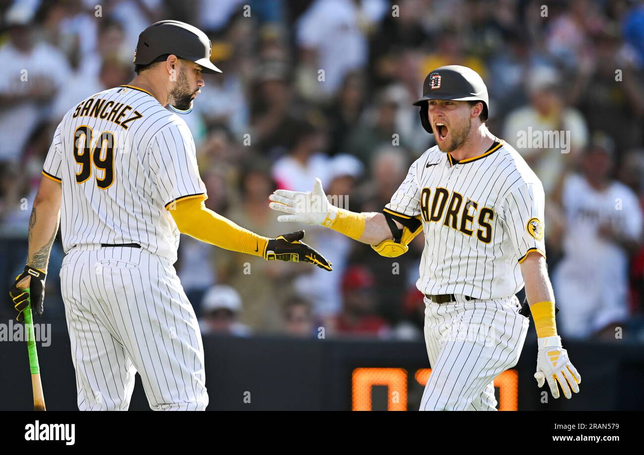 San Diego Padres' Jake Cronenworth, right, is congratulated by Gary ...