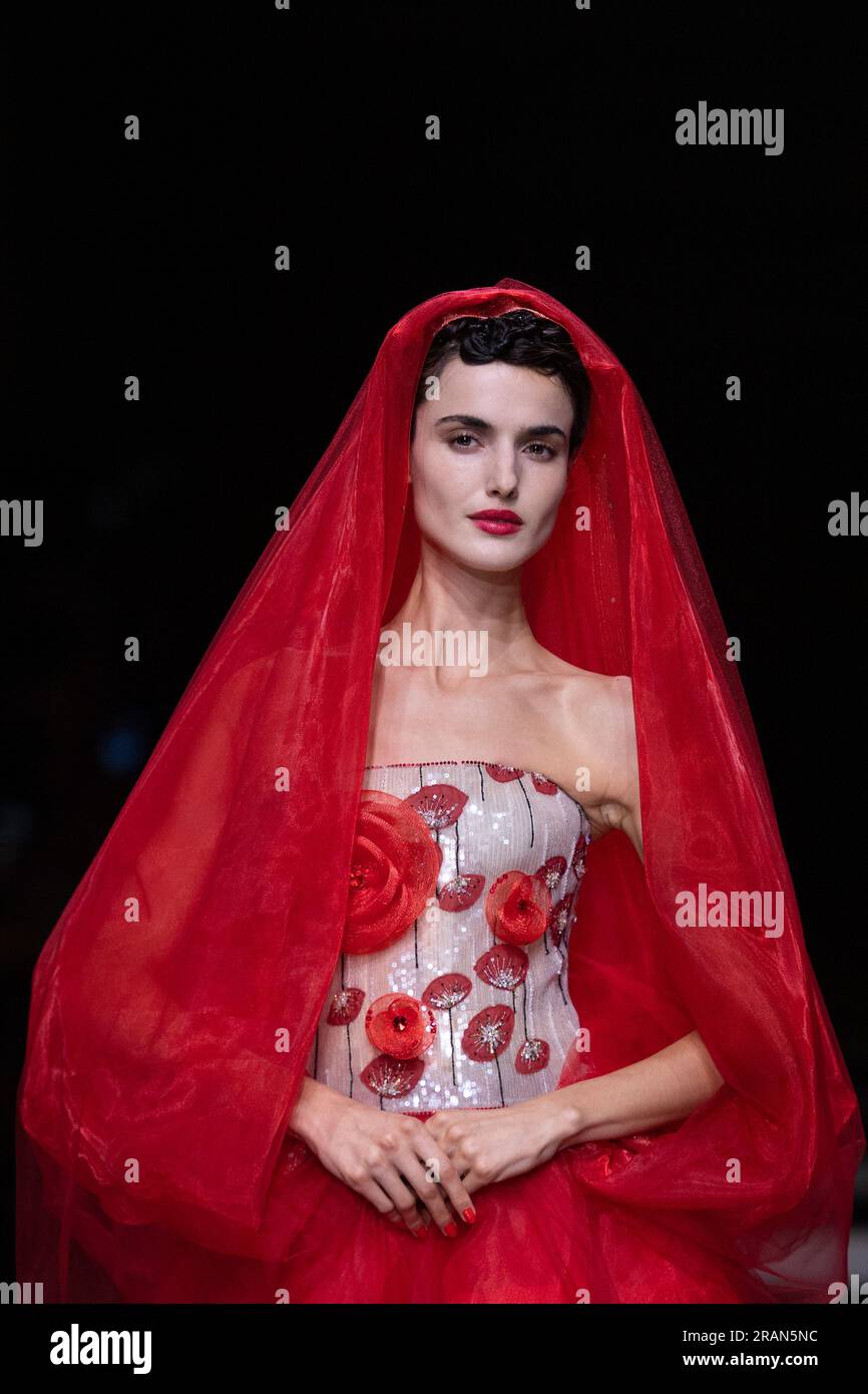 A model walks the runway during the Giorgio Armani Prive Haute couture ...