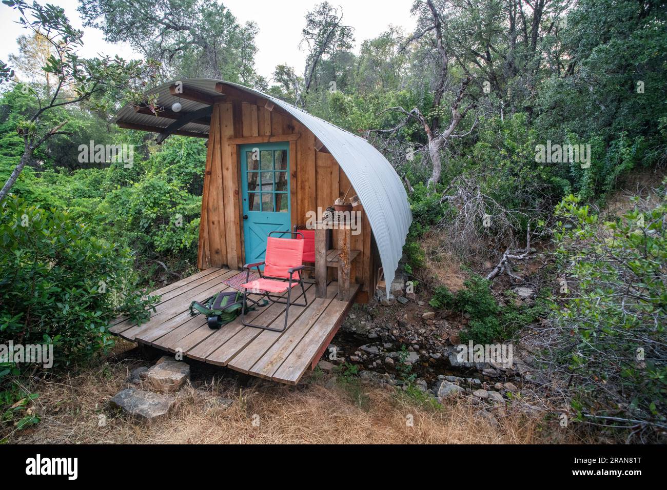 A small but beautiful wooden cabin the forest in California Stock Photo ...