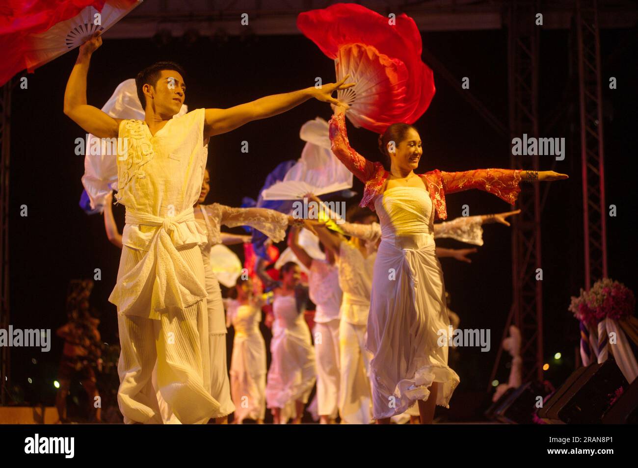 An unidentified of modern flags dancing perform a tourist show. At the ...