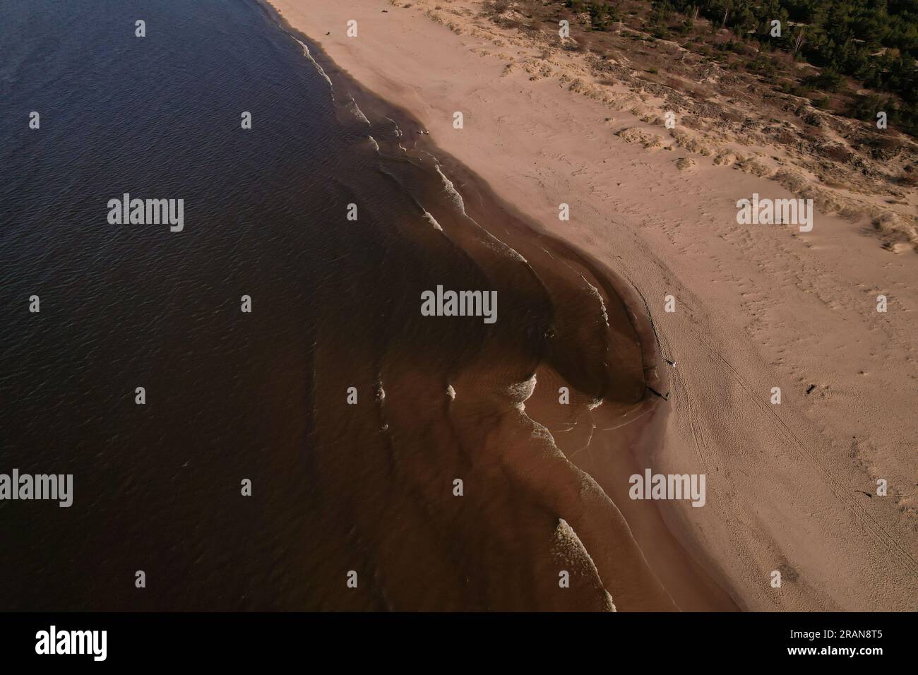 Drone aerial view of waves sea ocean coast. Beach and dunes dark calm ...