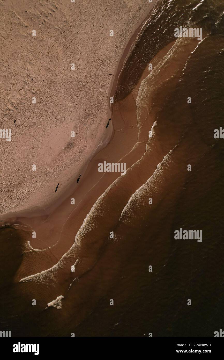 Drone aerial view of waves sea ocean coast. Beach and dunes dark calm ...