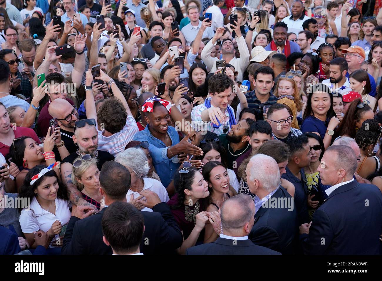 President Joe Biden greets the crowd on the South Lawn of the White ...