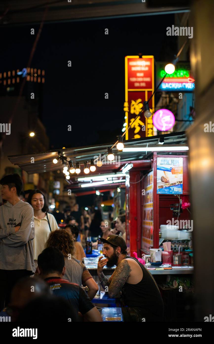 Kuala Lumpur, Malaysia - July 1, 2023: Street scene of KL Chinatown during evening, dusk hour ...