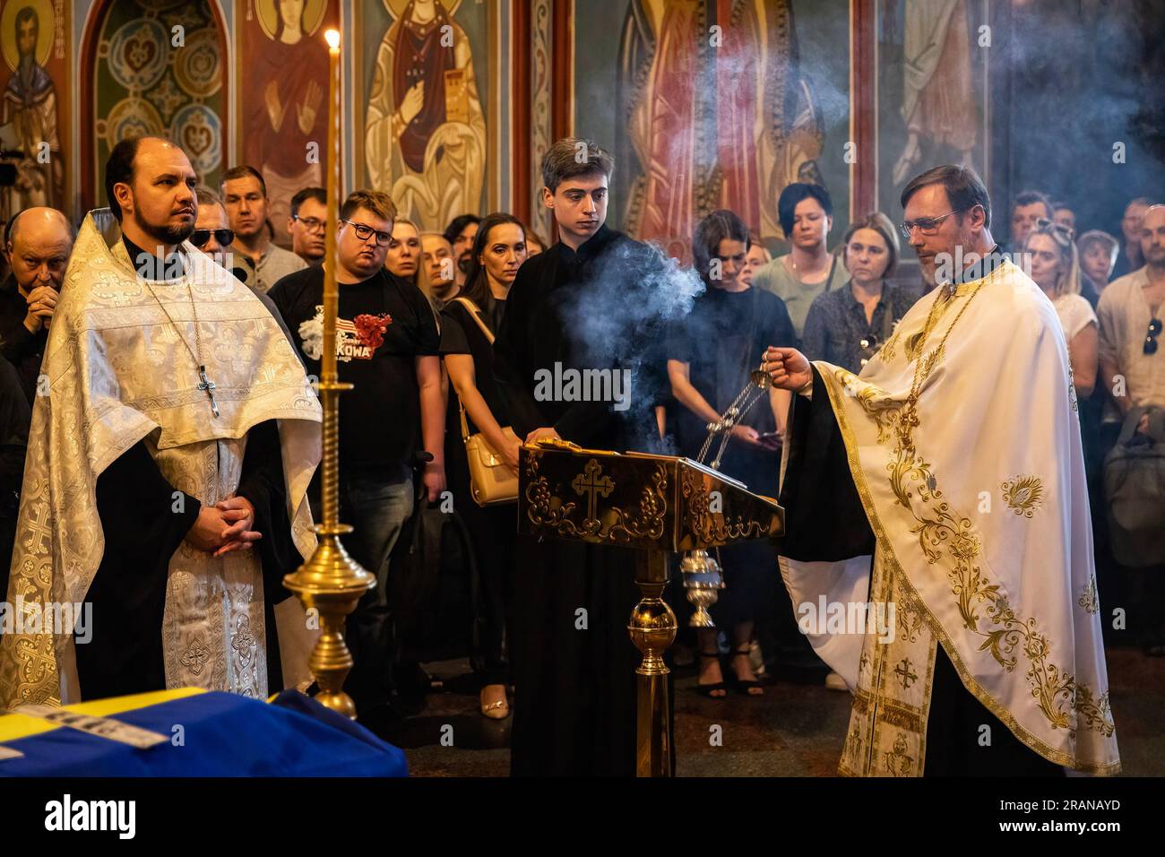 Priests performing a ritual during the memorial service of Victoria ...