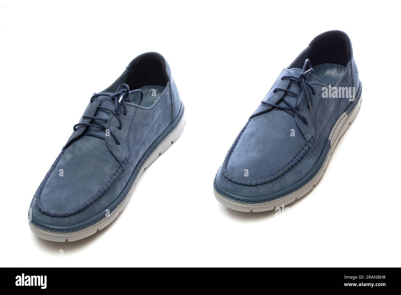 Blue leather men's shoes on a white background Stock Photo - Alamy