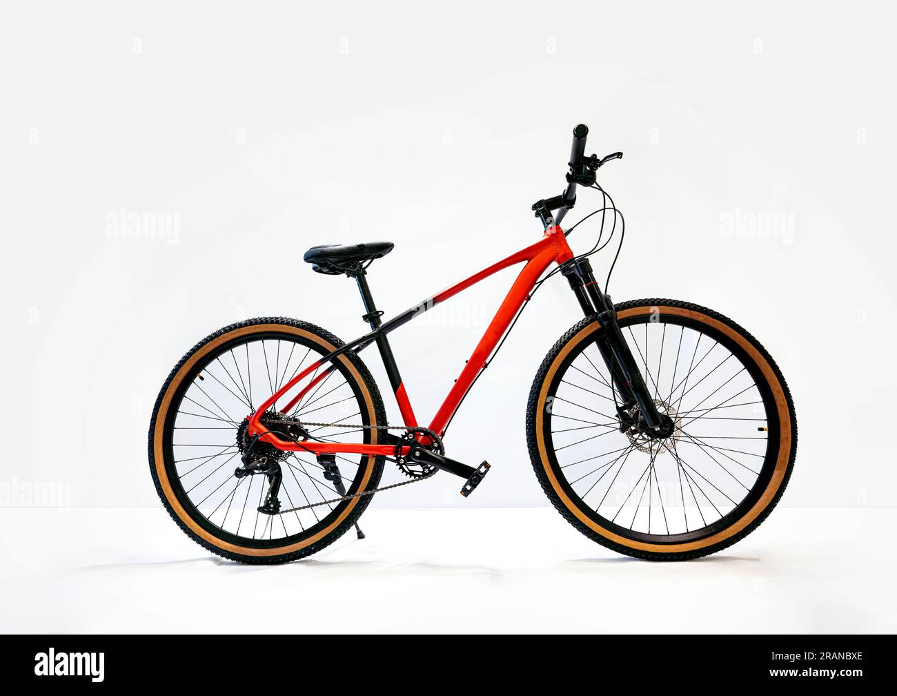 Red mountain bike isolated on white background Stock Photo - Alamy