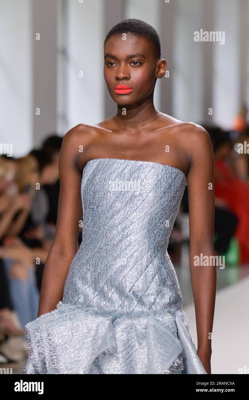Paris, France. 04th July, 2023. A model walks the runway at the Rami Al ...