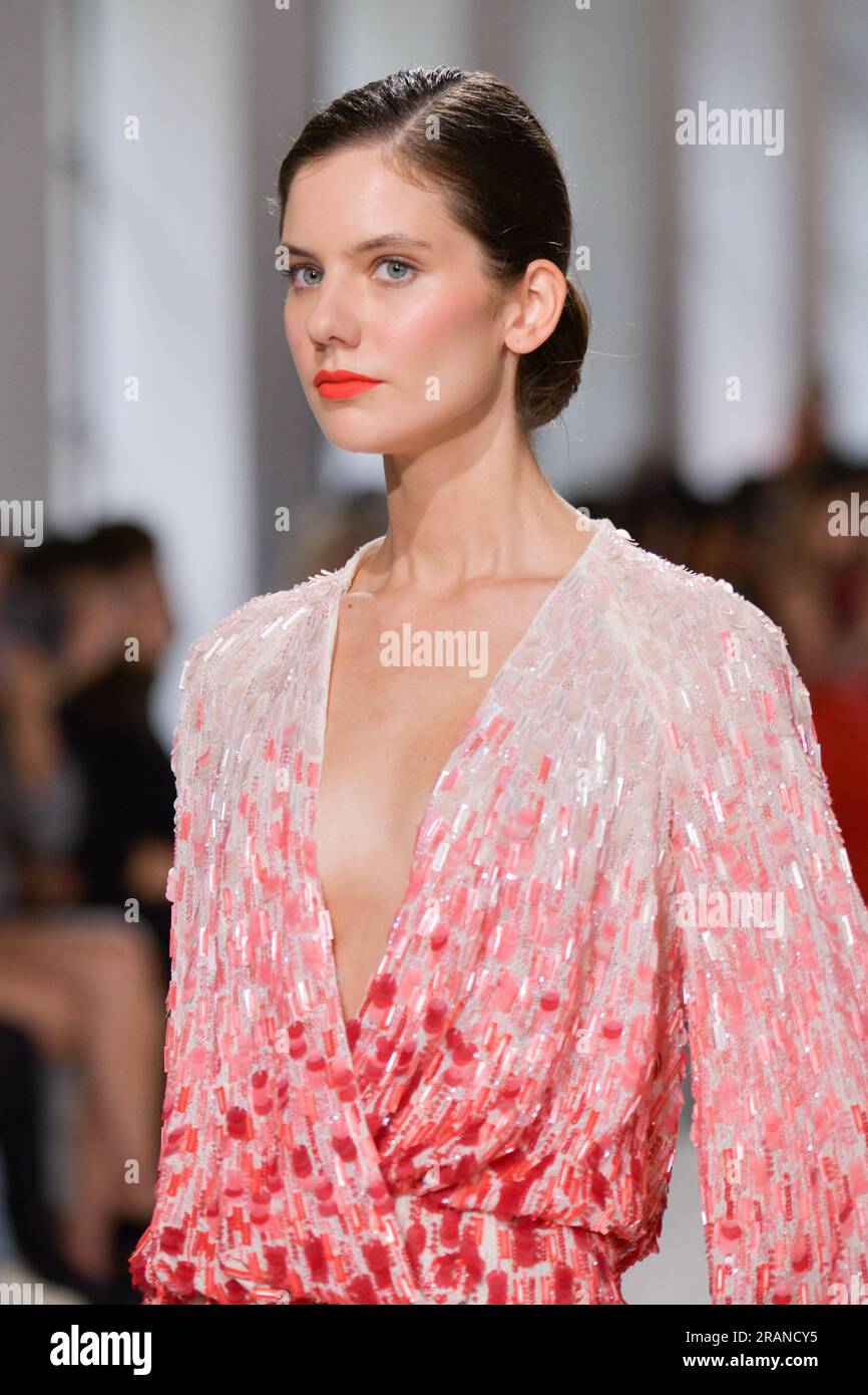 Paris, France. 04th July, 2023. A model walks the runway at the Rami Al ...