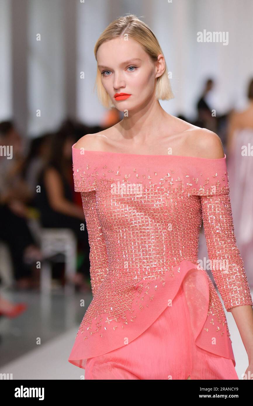 Paris, France. 04th July, 2023. A model walks the runway at the Rami Al ...