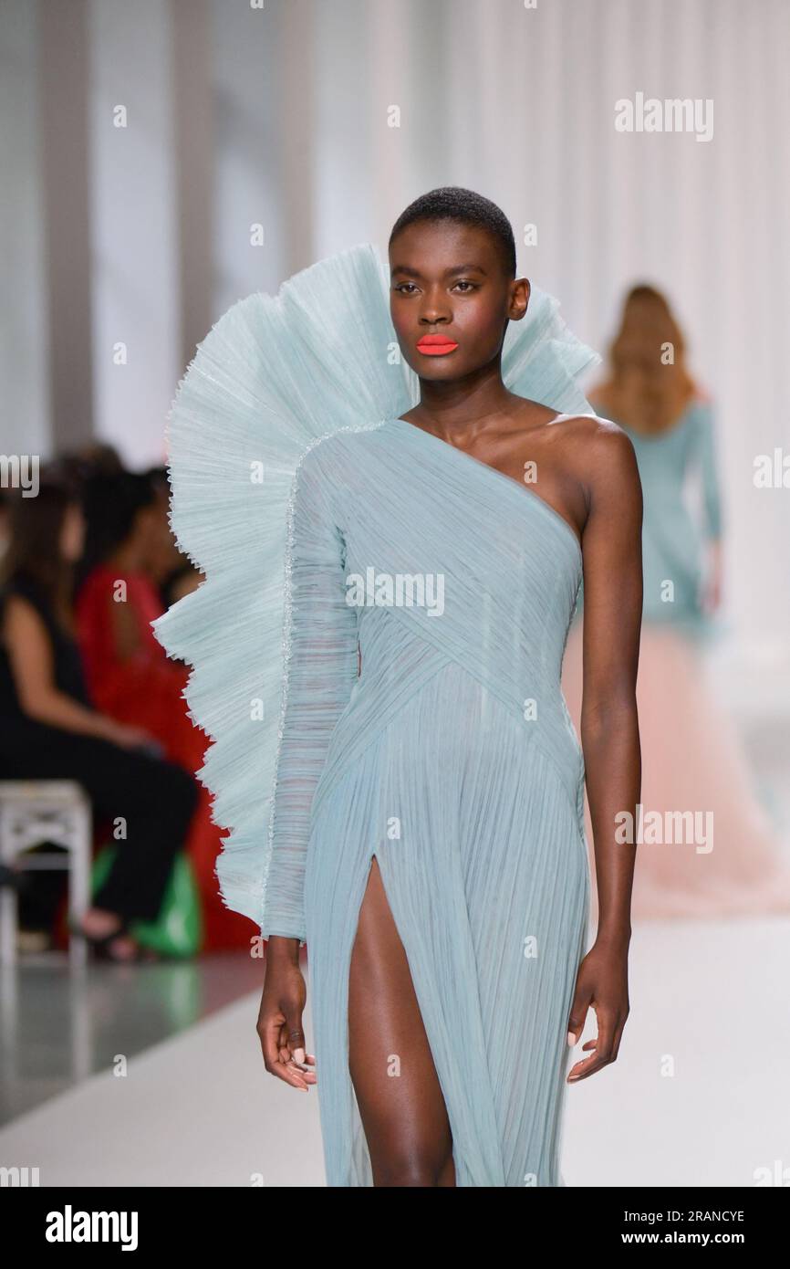 Paris, France. 04th July, 2023. A model walks the runway at the Rami Al ...