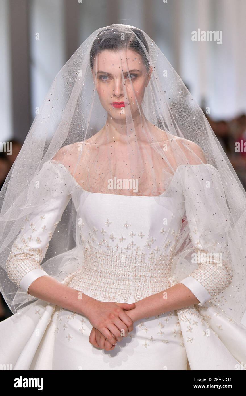 Paris, France. 04th July, 2023. A model walks the runway at the Rami Al ...