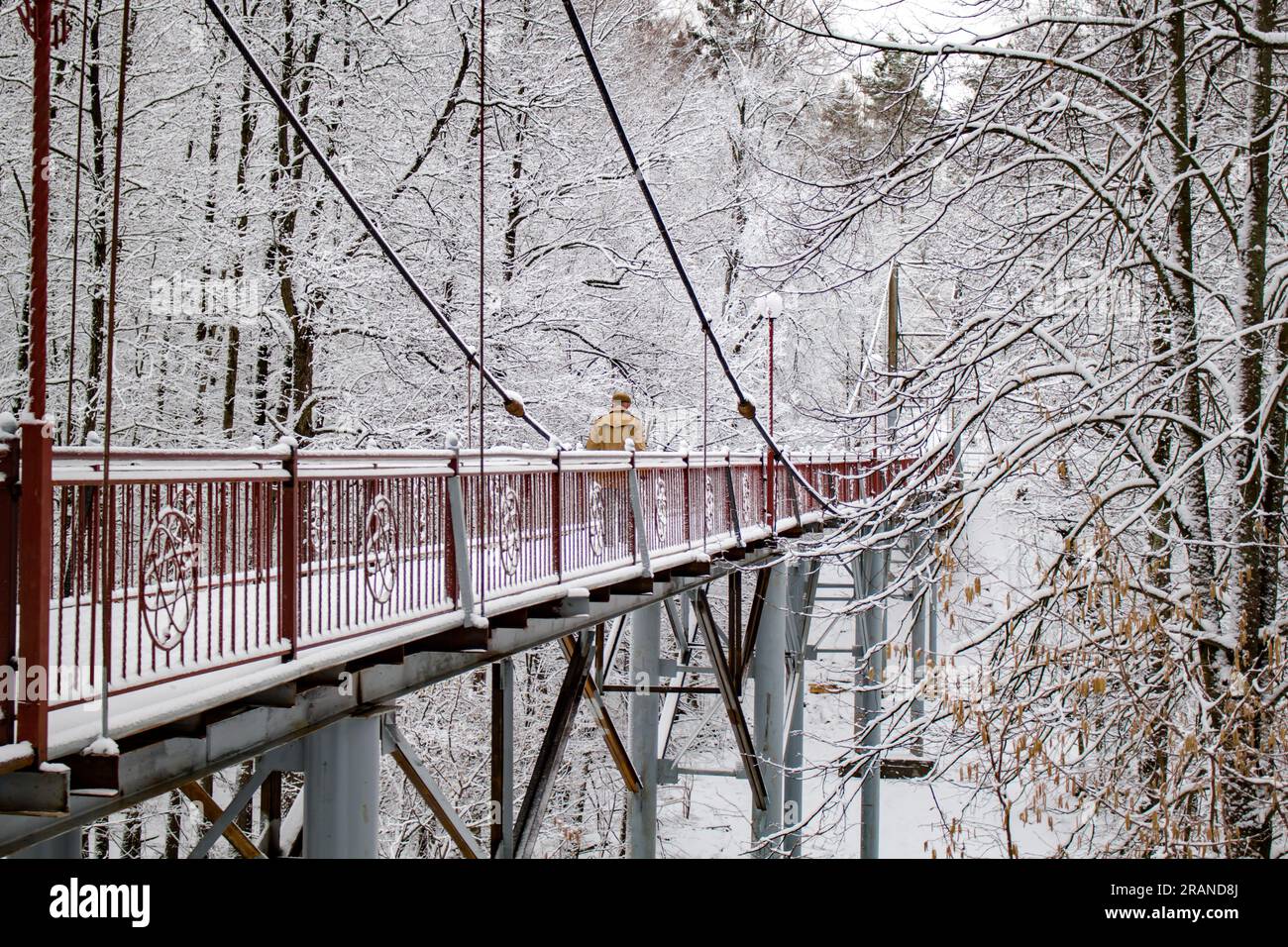 Snow-covered pedestrian bridge across the ravine. Obninsk, Russia Stock ...