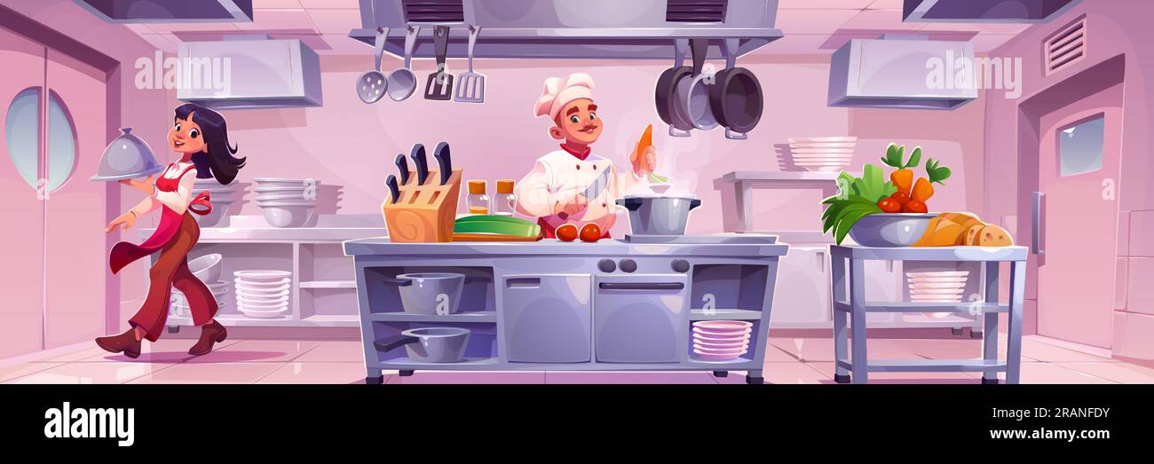 Male chief cooking in restaurant kitchen, waitress carrying cloche tray ...