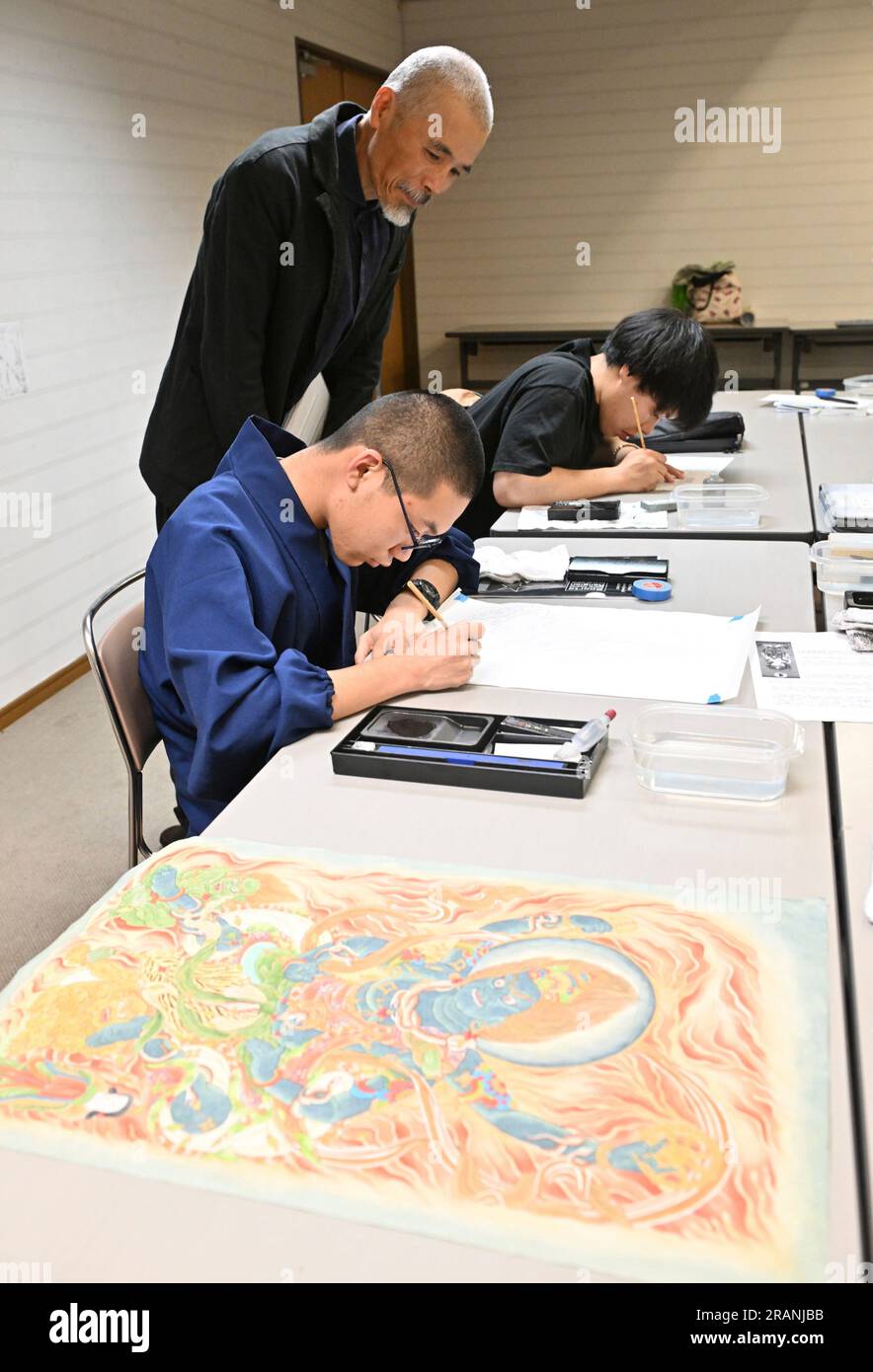 Students learn how to draw Buddhist paintings at Esoteric Buddhism ...