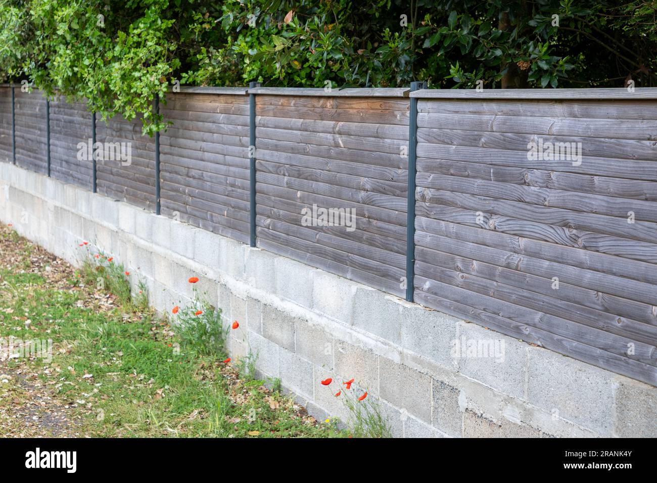fender street wall wooden barrier slats around the house fence ...