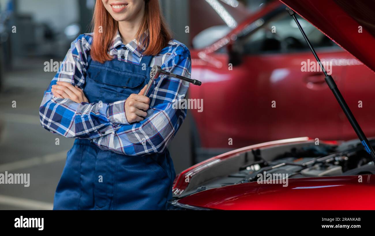 Woman auto mechanic stands hi-res stock photography and images - Alamy