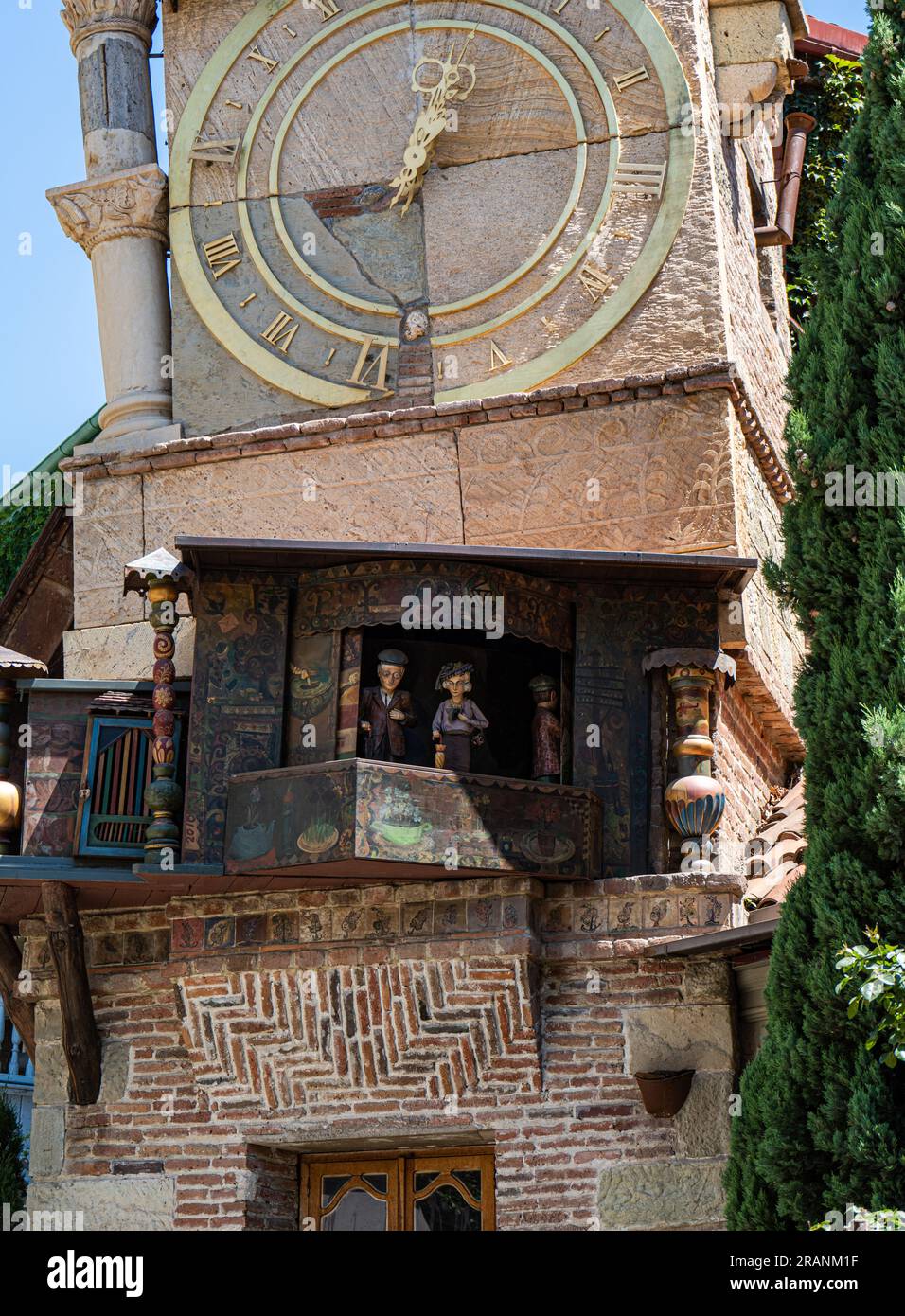 Falling clock tower of Puppet theatre in Old Tbilisi, summer in Georgia ...