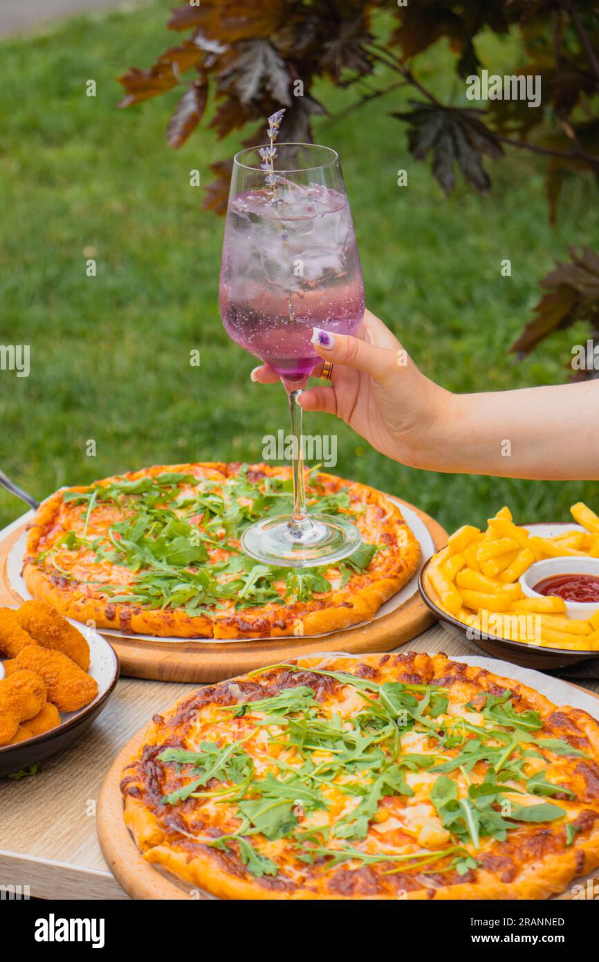 Two pan pizzas in two pizza boxes with their two different flavors ...