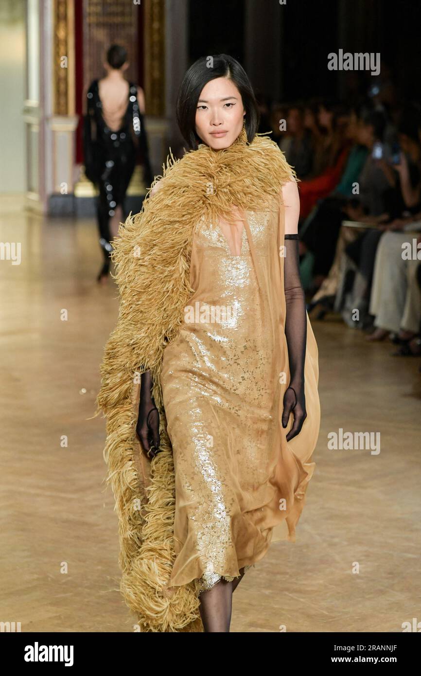 Paris, France. 04th July, 2023. A model walks the runway at the Georges ...
