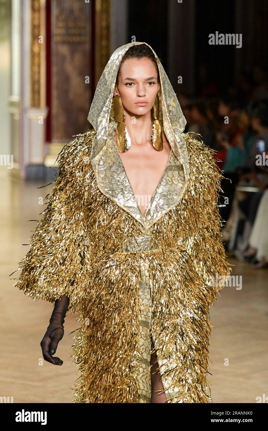 Paris, France. 04th July, 2023. A model walks the runway at the Georges ...