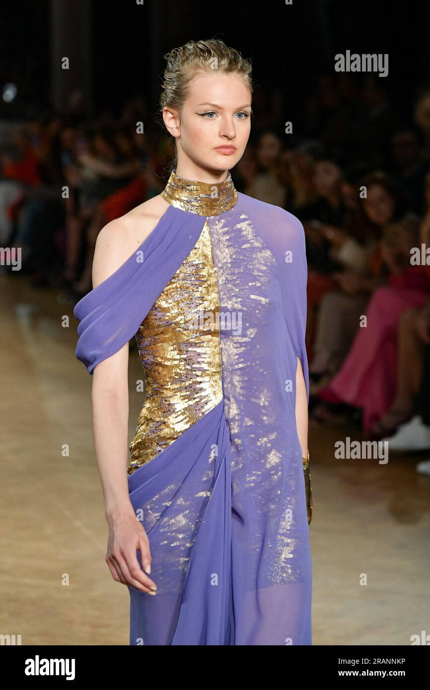 Paris, France. 04th July, 2023. A model walks the runway at the Georges ...