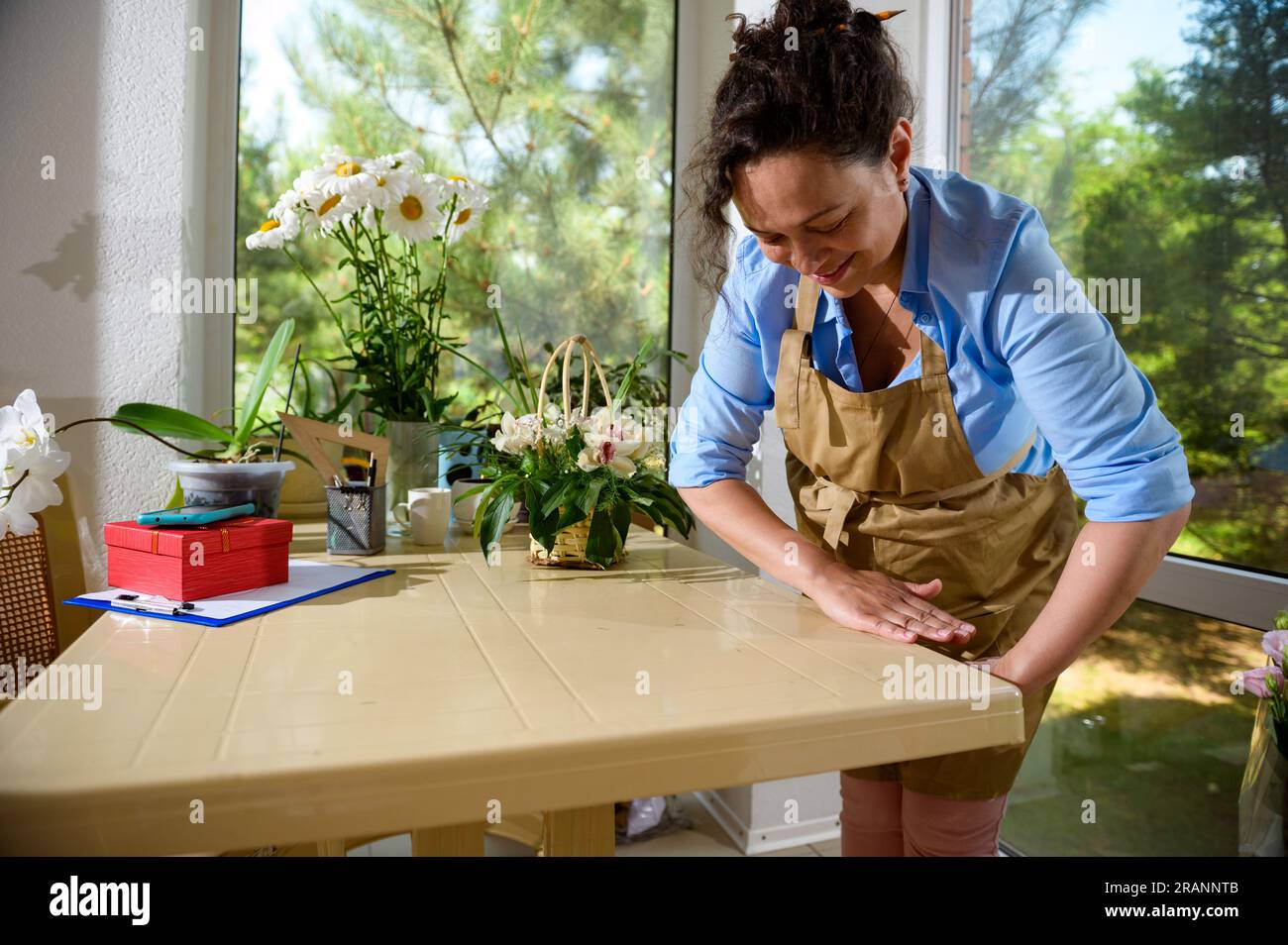 Pleasant woman florist floral hi-res stock photography and images - Alamy