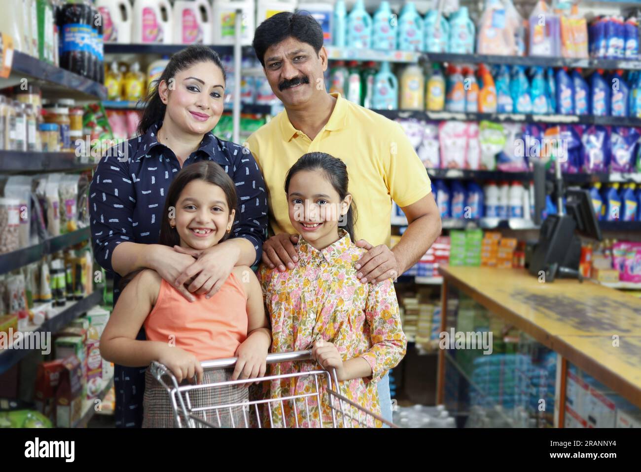 Mother and daughter shopping grocery in mini mall hi-res stock ...